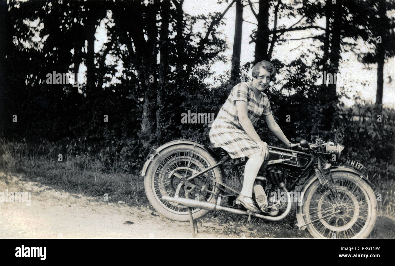 Woman poses for photograph sat on a 1921 Sunbeam 500cc Model 6/7 ...