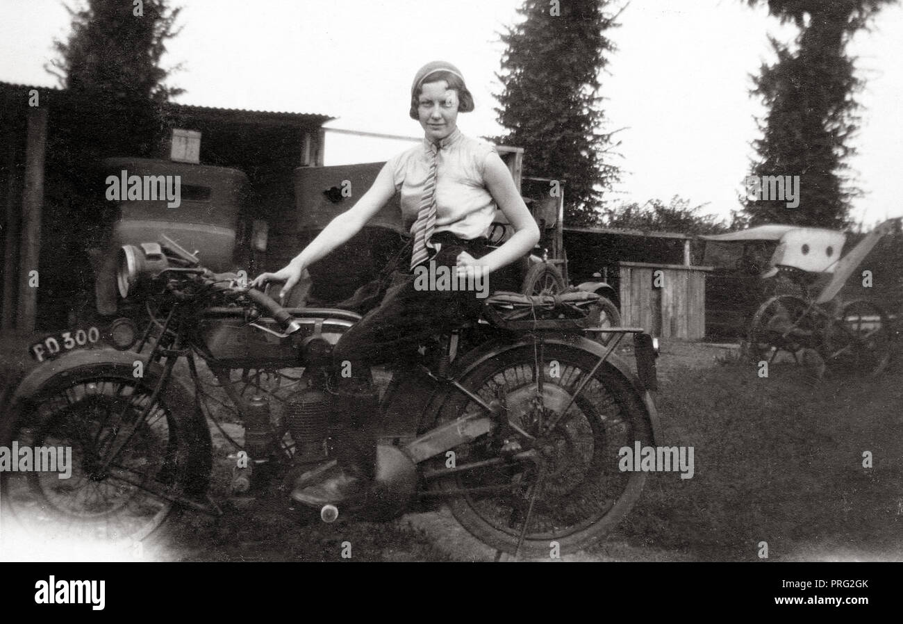 Stylish lady sat on a 1922 BSA 500cc side valve motorcycle in the 1920s ...
