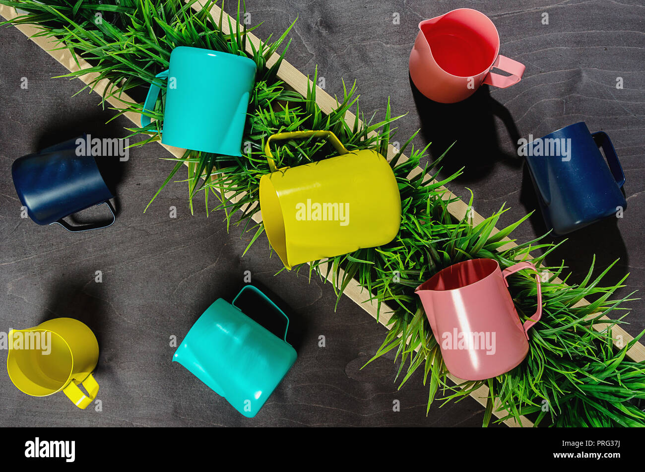 pitchers for baristas different colors Stock Photo - Alamy