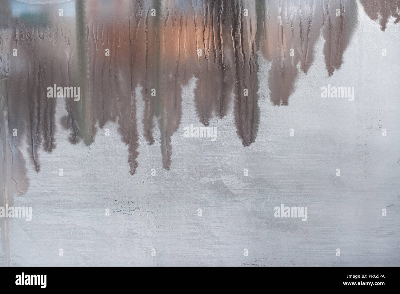 Winter frozen window glass with vertical drips and copy space Stock ...