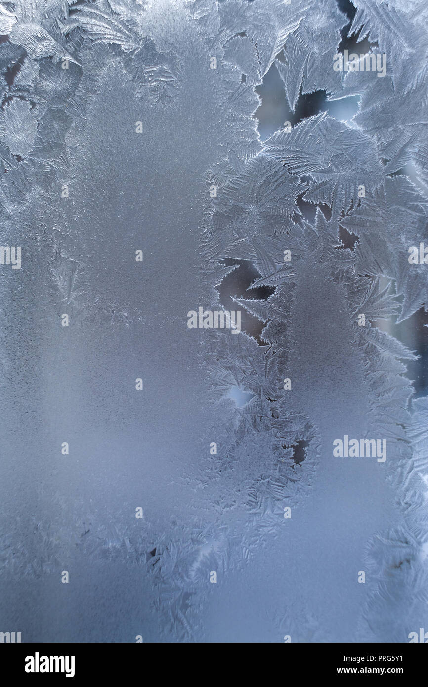 Delicate translucent ice pattern on window with copy space Stock Photo ...