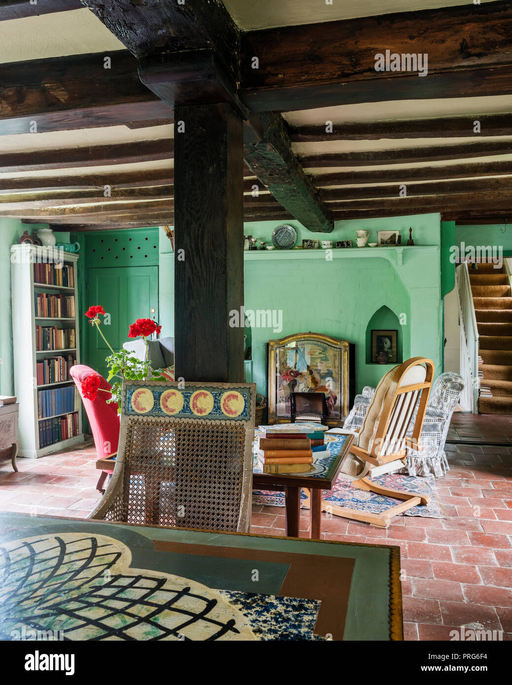 Cane chairs at table in beamed cottage, once home to Virginia Wolfe ...