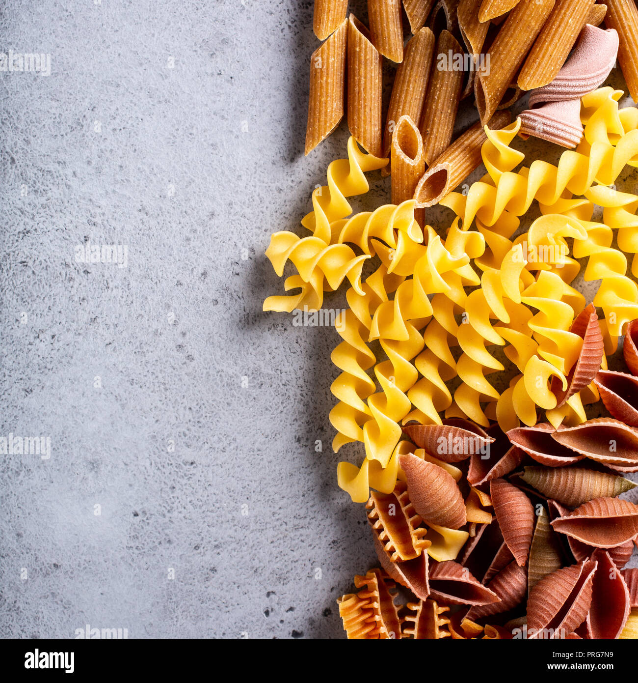 Assorted colorful italian pasta Stock Photo - Alamy