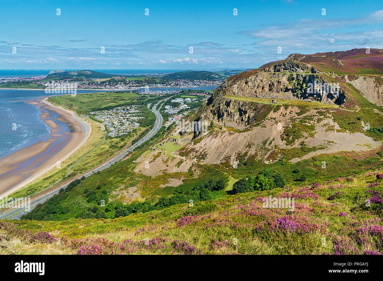Disused stone quarry on Conwy Mountain looking east towards Llandudno ...