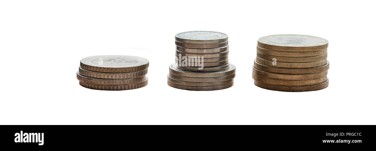 Three stacks of coins on a white background Stock Photo - Alamy