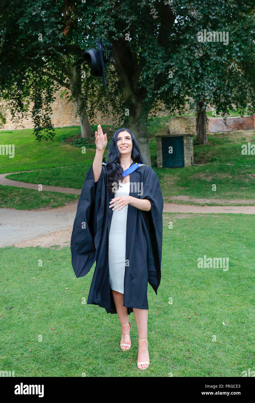 Pretty cheerful young lady hi-res stock photography and images - Alamy