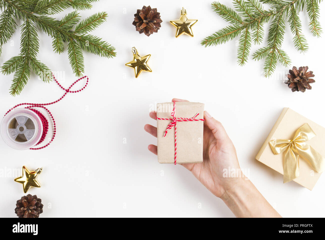 Woman packing surprise gift hi-res stock photography and images - Alamy
