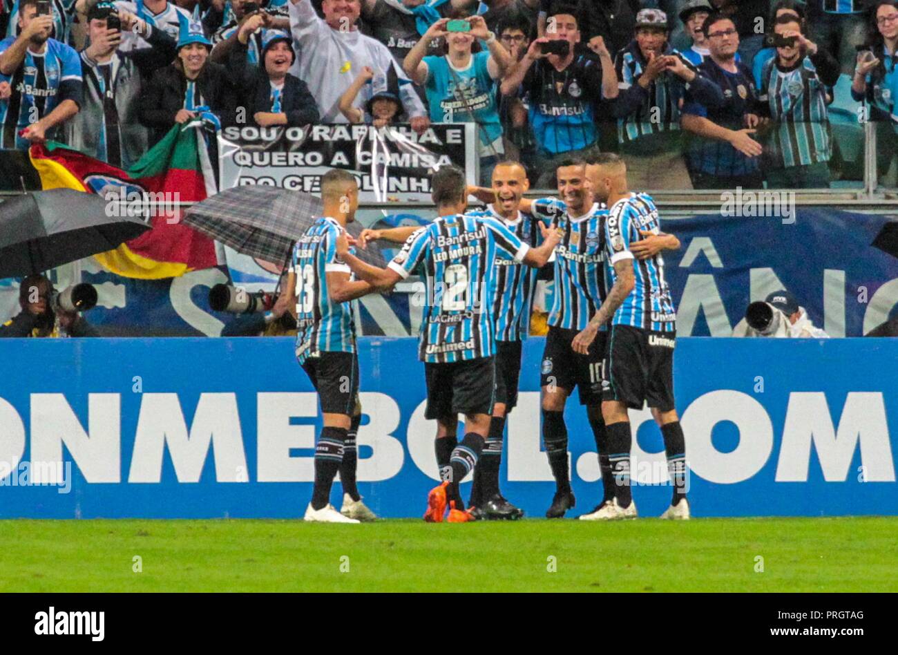 Gremio celebrates his goal with players of his team during match ...