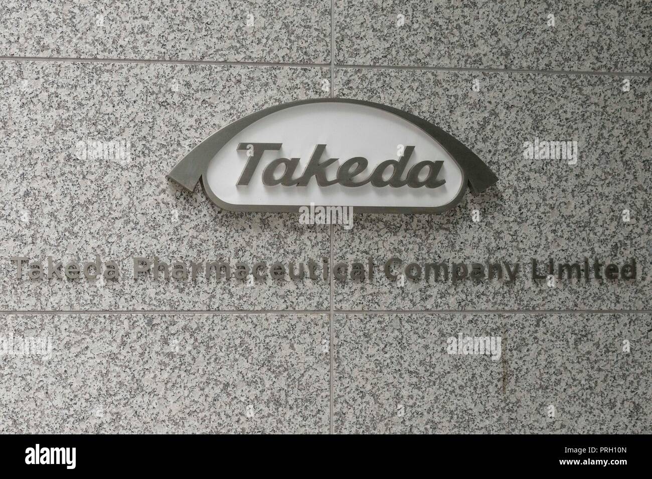 A signboard of Takeda Pharmaceutical Co., Ltd. on display outside its ...