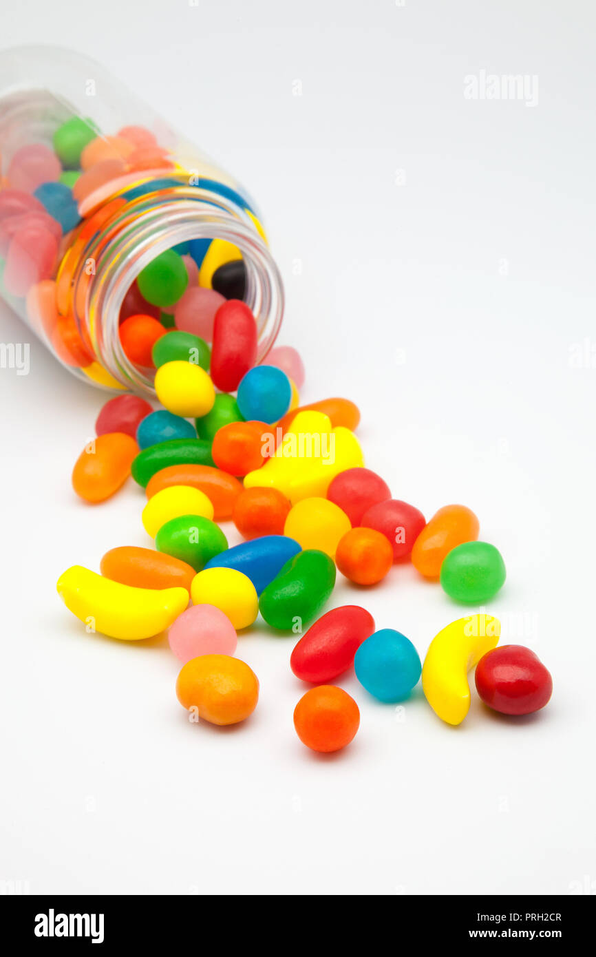 jar spilling colors gum candies Stock Photo - Alamy