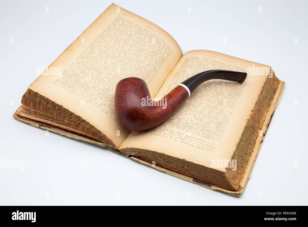 old book open with tobacco pipe Stock Photo - Alamy