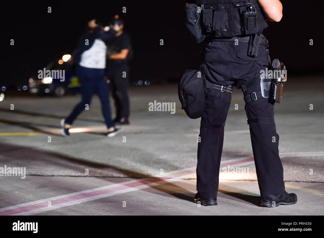 Night scene with special forces showing their skills in a simulated ...