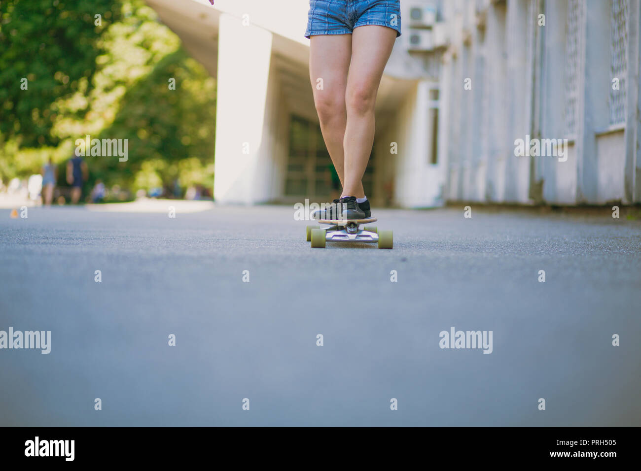 Great legs of skateboarder Stock Photo - Alamy