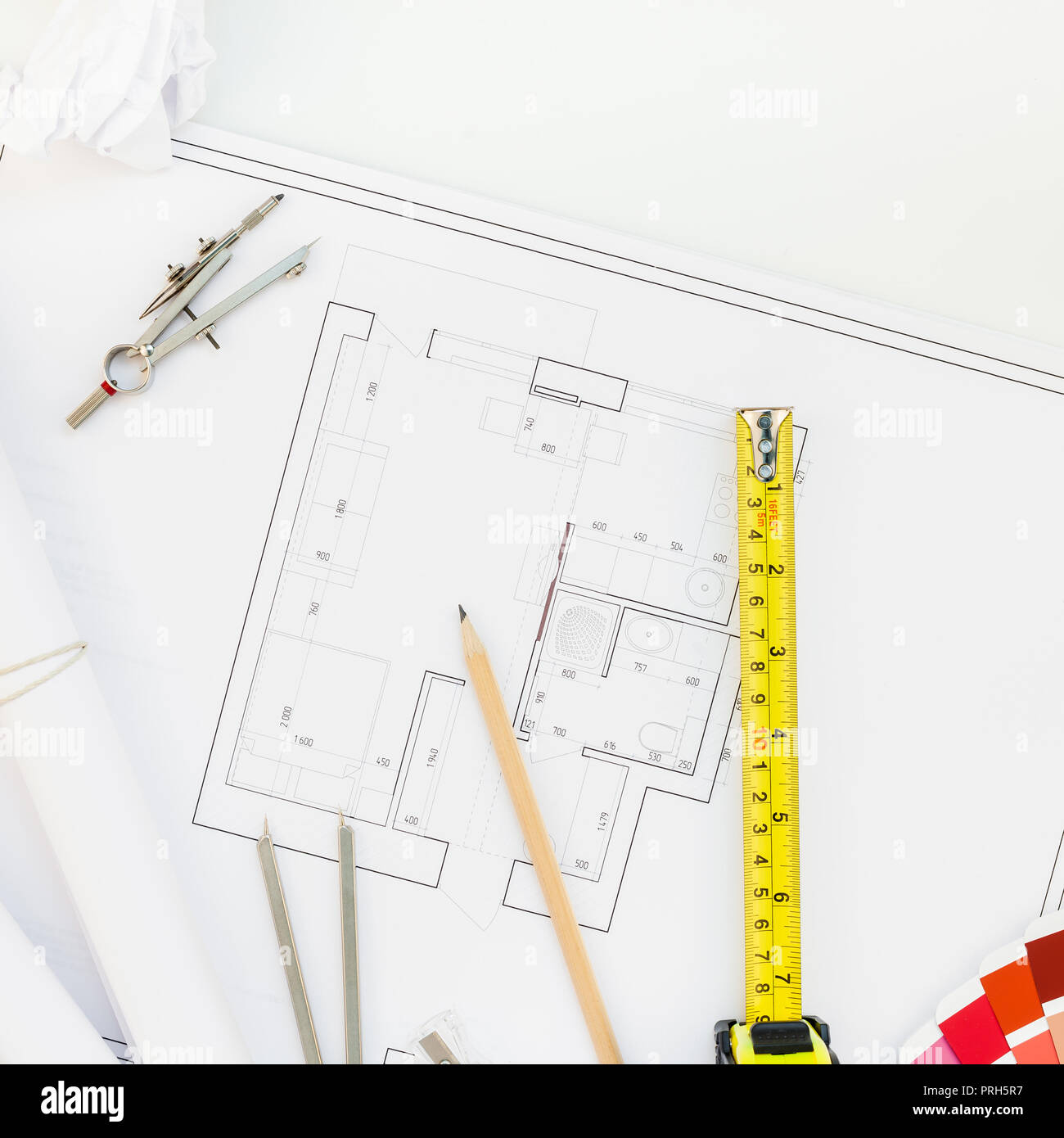 Creative flat lay overhead top view blueprints architectural flat ...