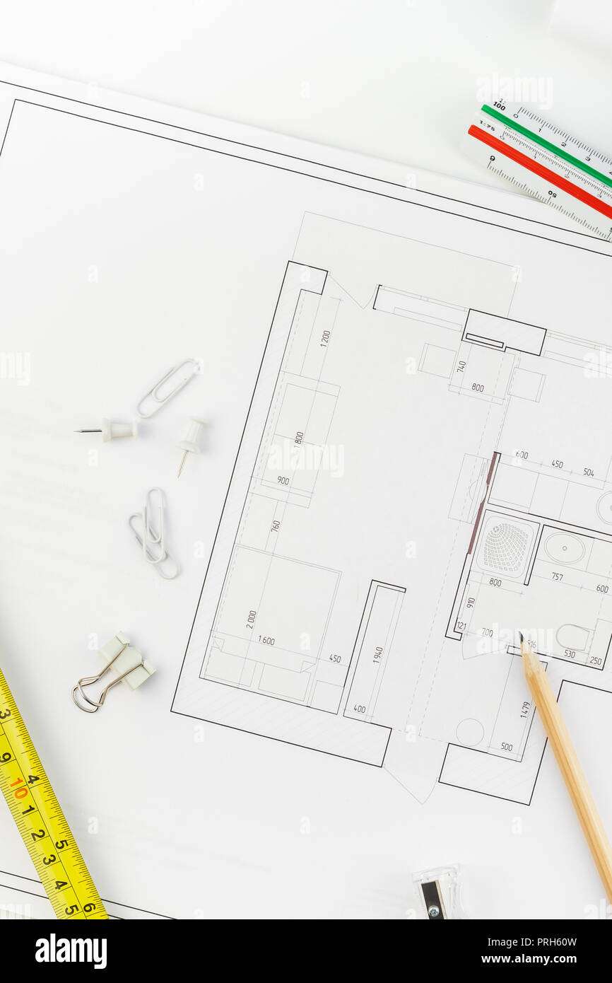 Creative flat lay overhead top view blueprints architectural flat ...