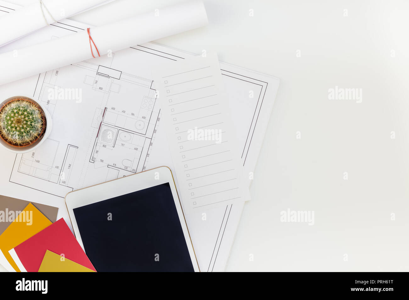 Creative flat lay overhead top view blueprints architectural flat ...