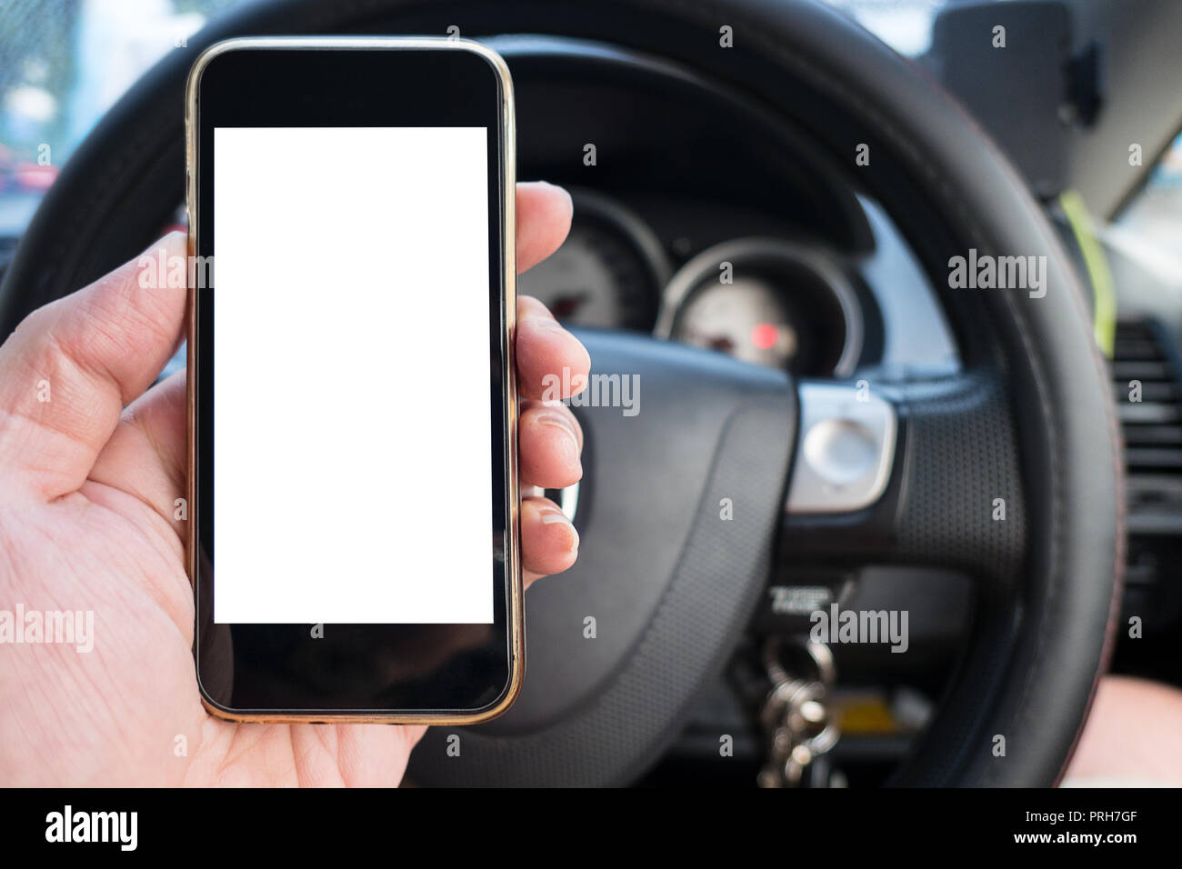 hand hold smartphone blank screen while driving car smart vehicle ...
