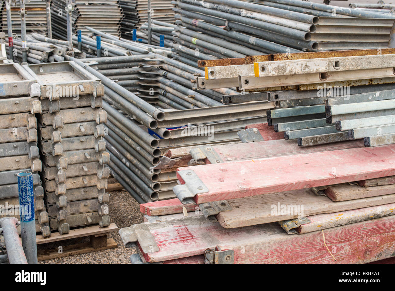 Assorted construction materials stored in piles Stock Photo - Alamy