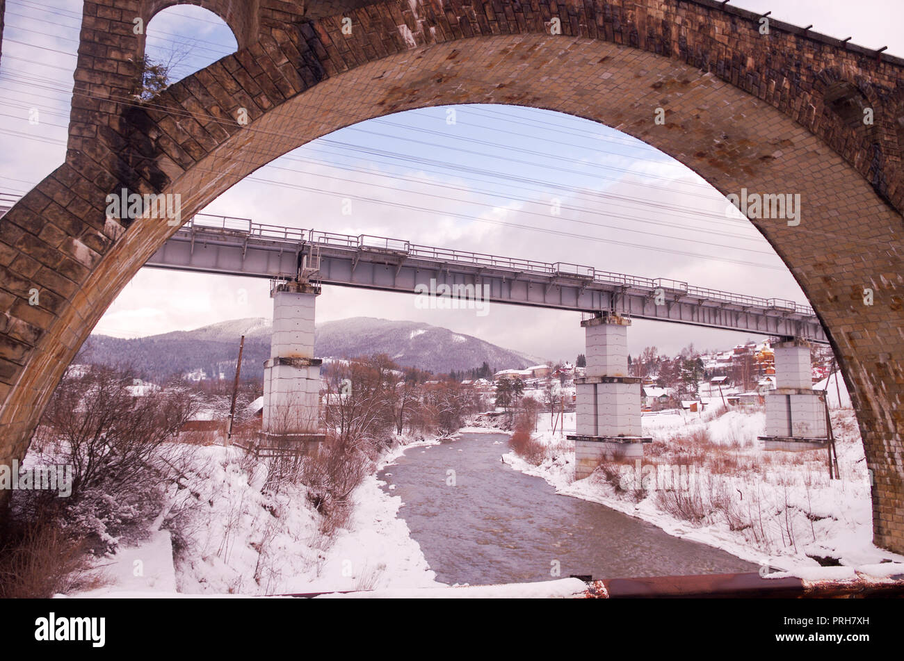 Arched bridge of brick. The central part of the bridge. Bridge Viaduct ...