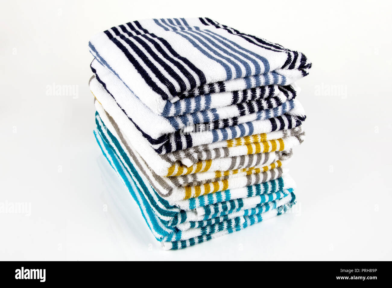 Stack of folded Towels isolated on white background Stock Photo - Alamy