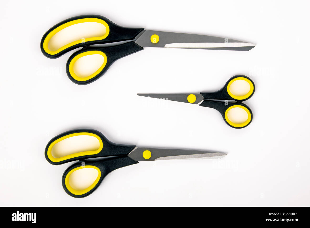 Three Scissors isolated on white background Stock Photo - Alamy