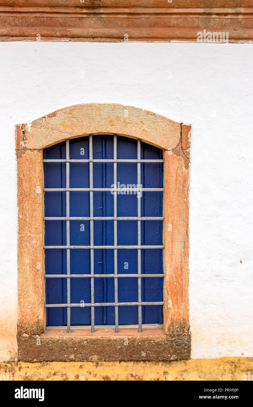 Old church window made of wood in colonial style with frame in stone in ...