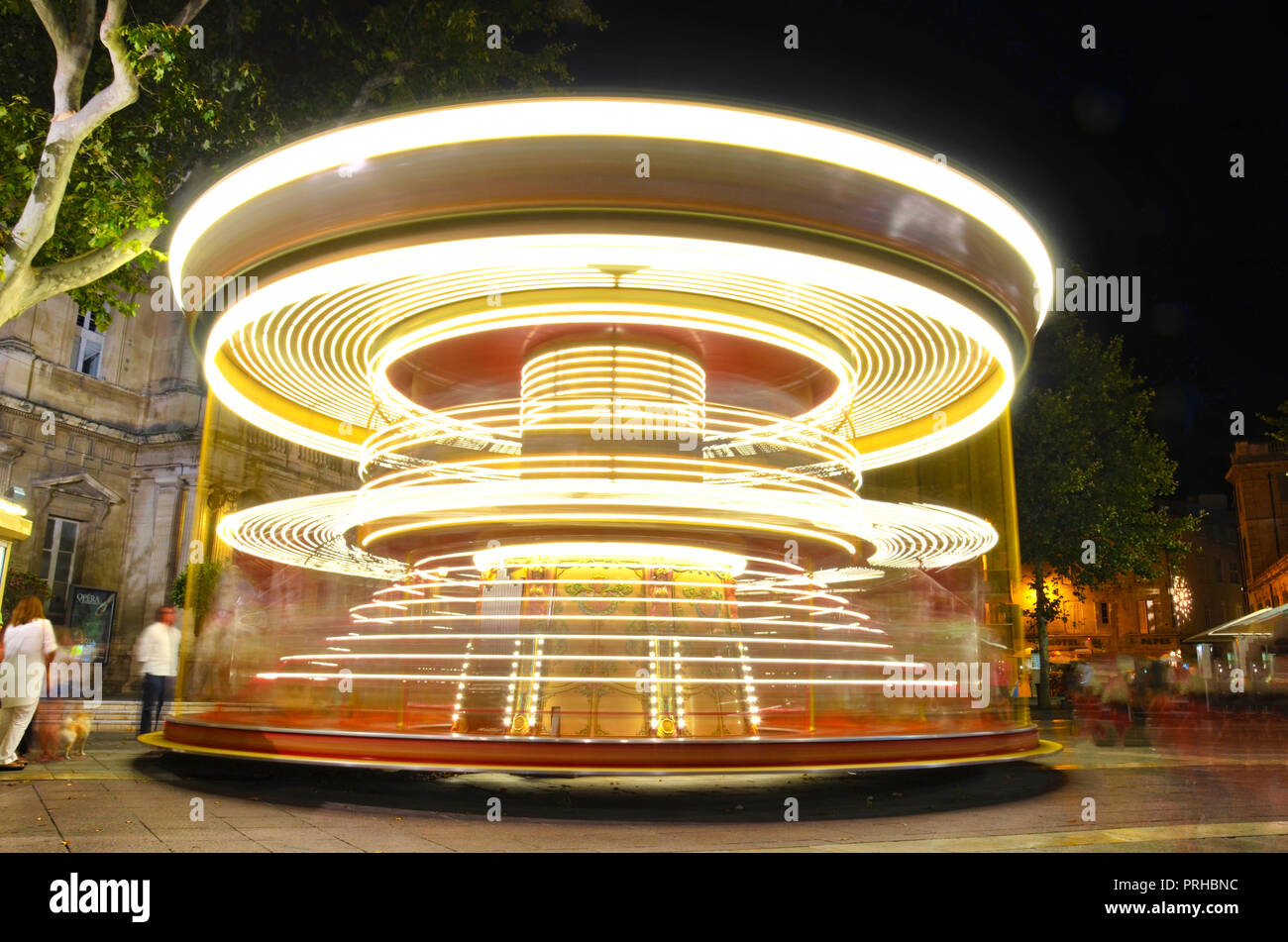 Vintage merry-go-round by night - long exposure background photo Stock ...