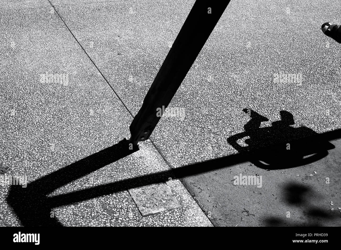 A shadow of a child on a swing Stock Photo - Alamy