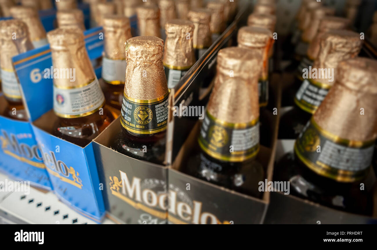 Six-packs of Constellation Brands' Modelo brand beer in a supermarket ...