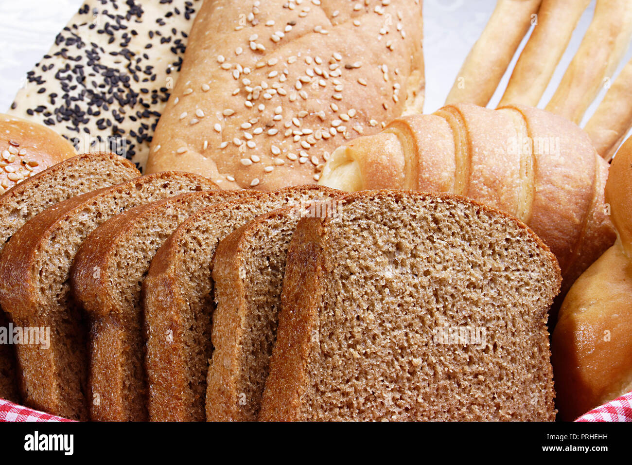 Assorted bread in a basket Stock Photo - Alamy
