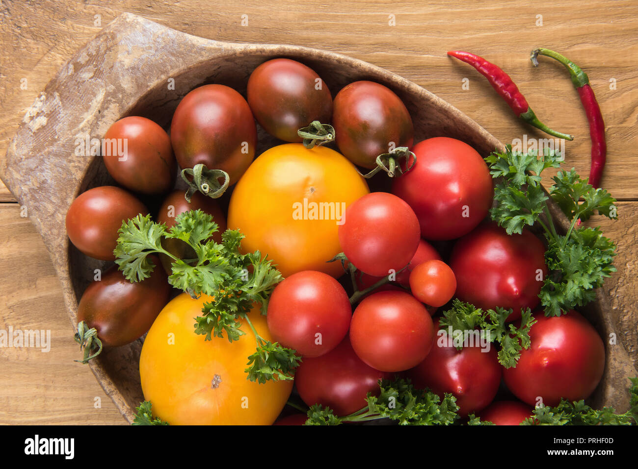 Big and small tomato hi-res stock photography and images - Alamy