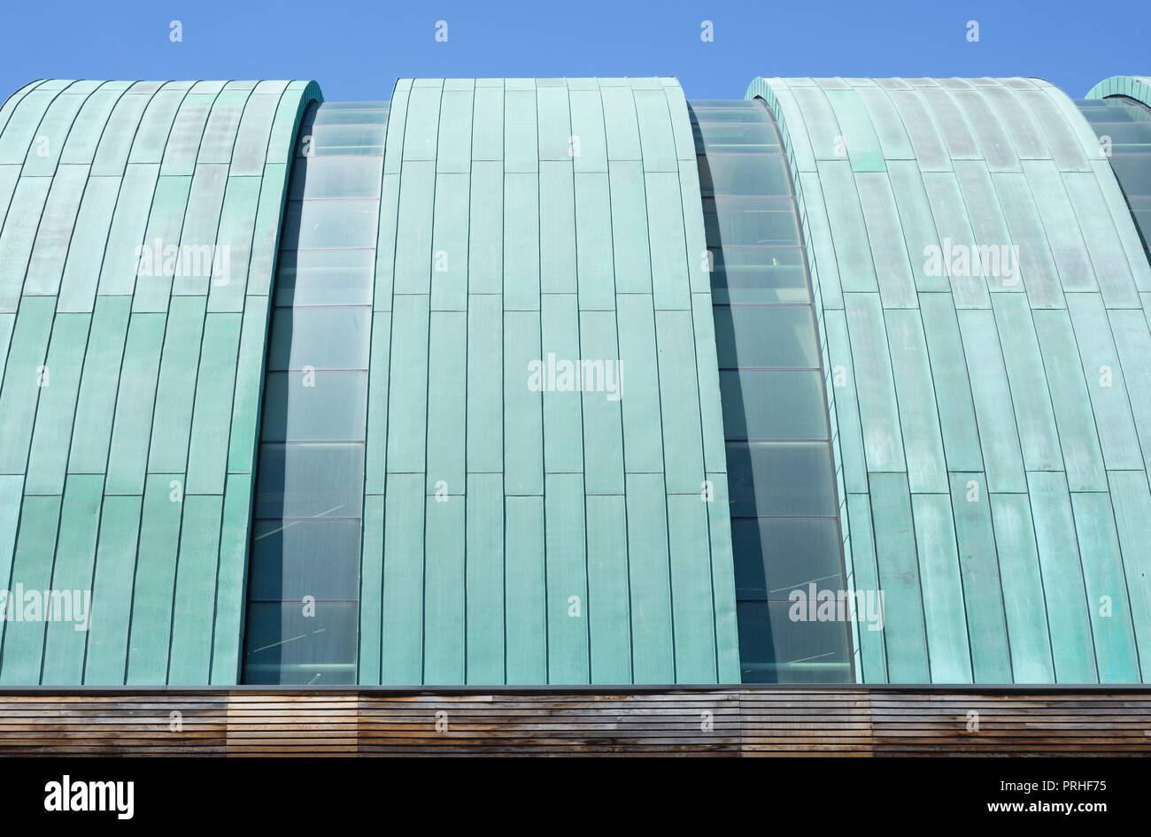 Curved metal-clad roof of LC2 leisure centre building, Swansea Stock ...