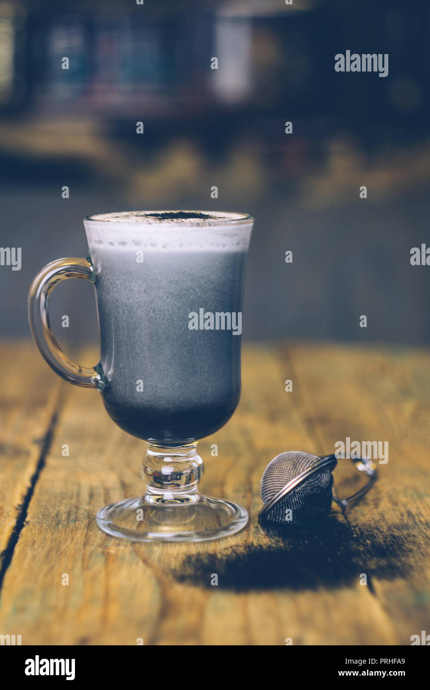 BLACK GOTH/GOTHIC CHARCOAL LATTE. Autumn Halloween coffee drink. Close ...