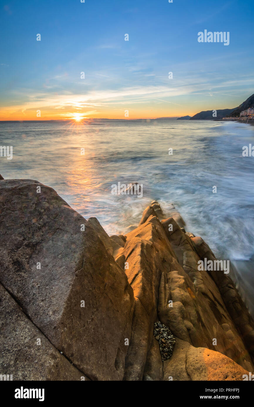 Sunset in Italy by the sea coast Italian Riviera Ligure Liguria Cinque ...