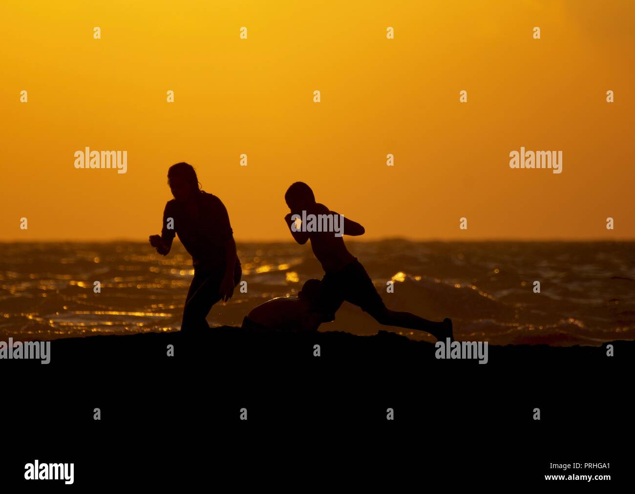 Shadow boy girl playing light hi-res stock photography and images - Alamy