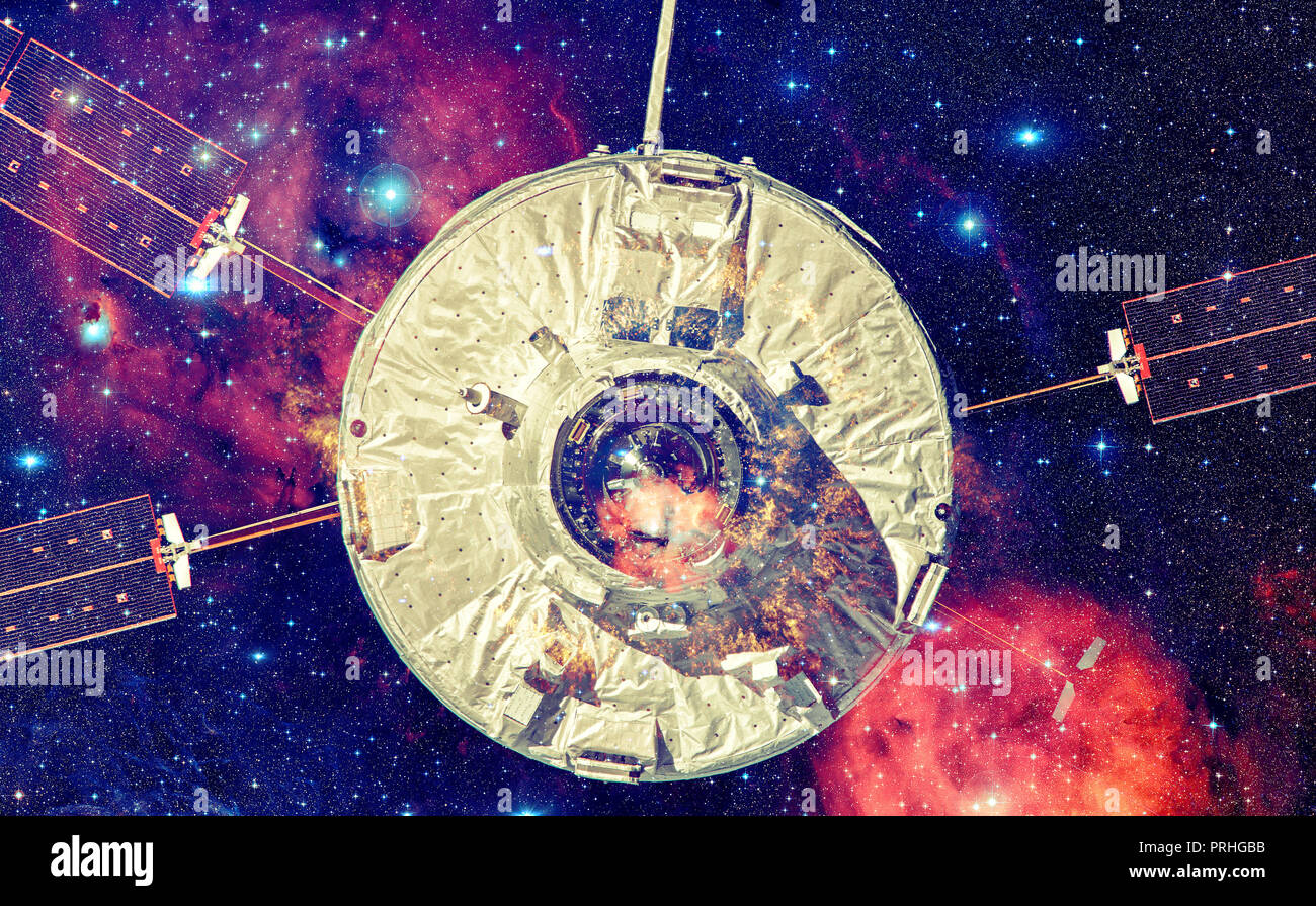 Spaceship in outer space against the background of the nebula. Elements ...