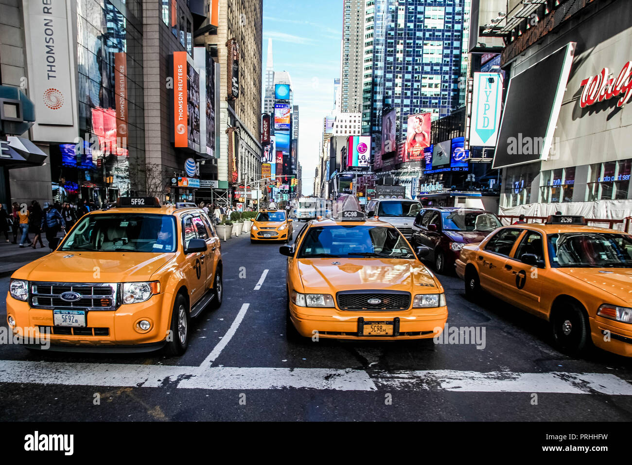 NEW YORK-NOVEMBER 6: Yellow cab and busy Time Square in Manhattan on ...