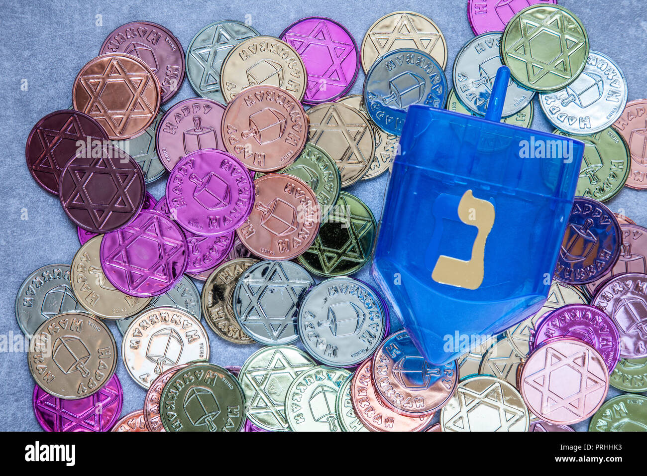 Large translucent blue plastic dreidl showing the Hebrew letter 'Nun ...