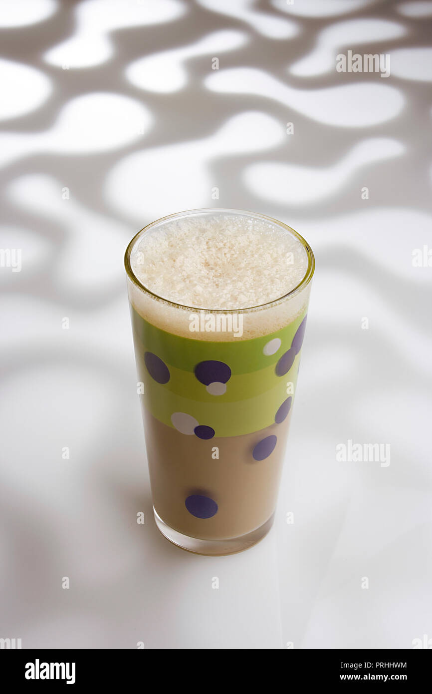 Cold Coffee against a white background Stock Photo - Alamy