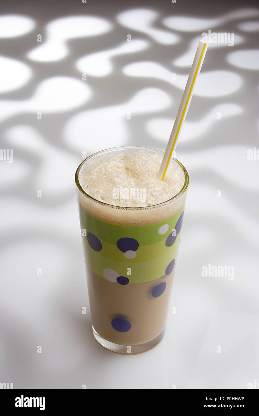 Cold Coffee against a white background Stock Photo - Alamy