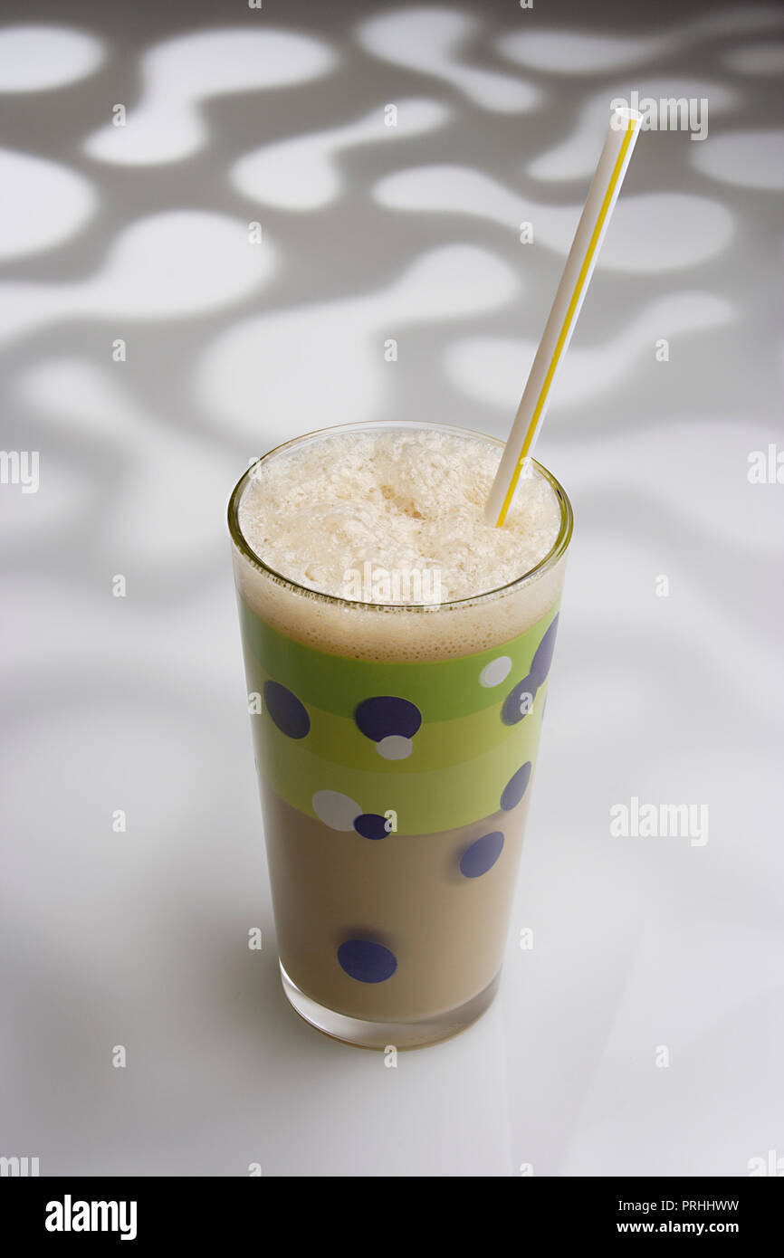 Cold Coffee against a white background Stock Photo - Alamy