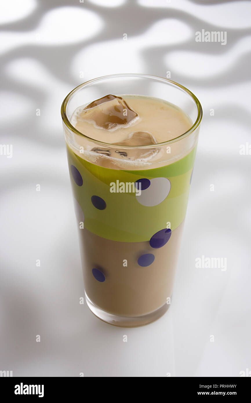 Cold Coffee against a white background Stock Photo - Alamy