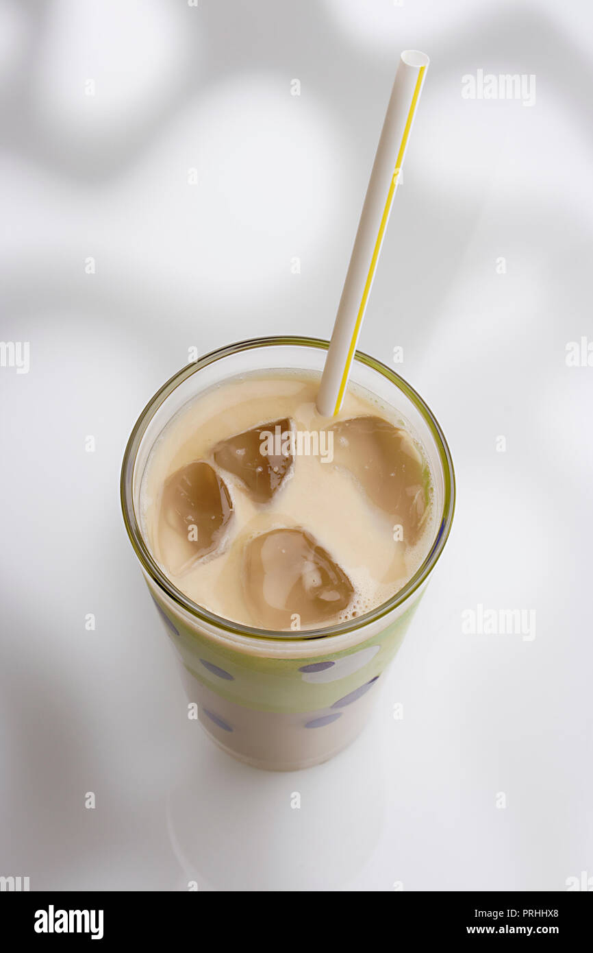 Cold Coffee against a white background Stock Photo - Alamy