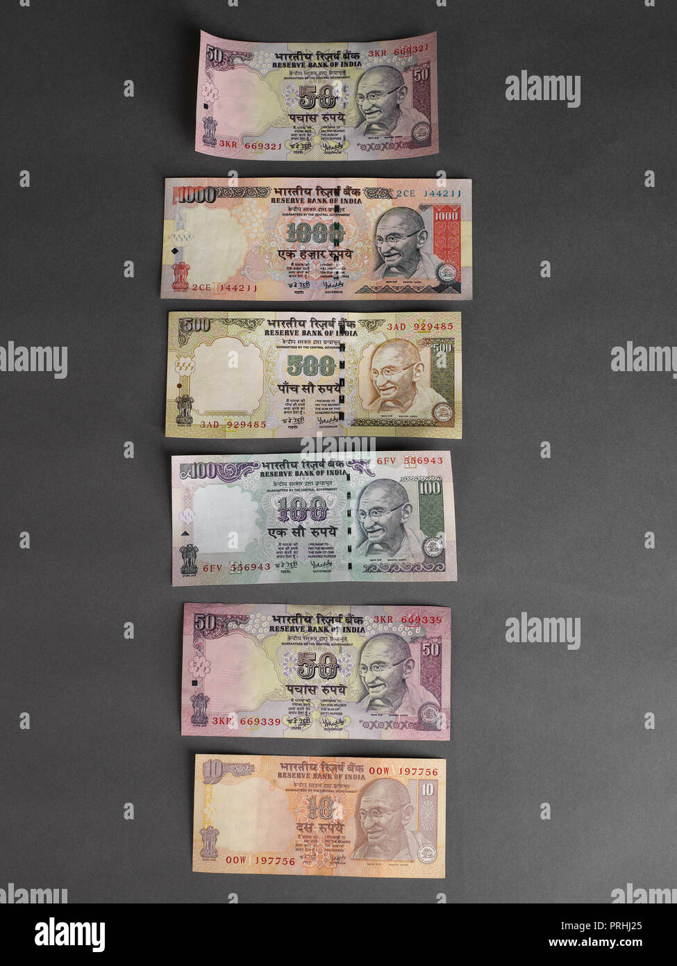 Man holding indian rupee notes hi-res stock photography and images - Alamy