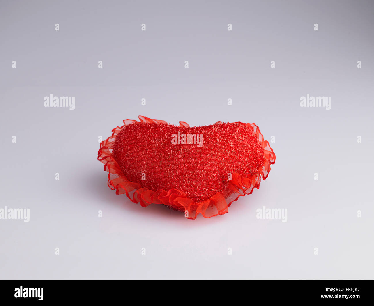 A STILL LIFE OF A HEART SHAPED FABRIC OBJECT Stock Photo - Alamy