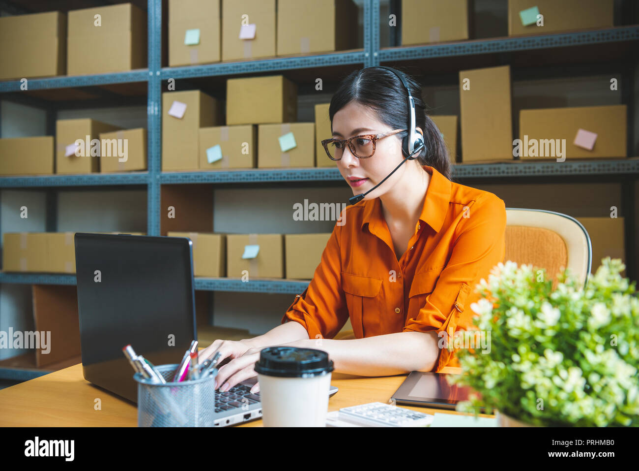 Secretary wearing headset glasses typing hi-res stock photography and ...