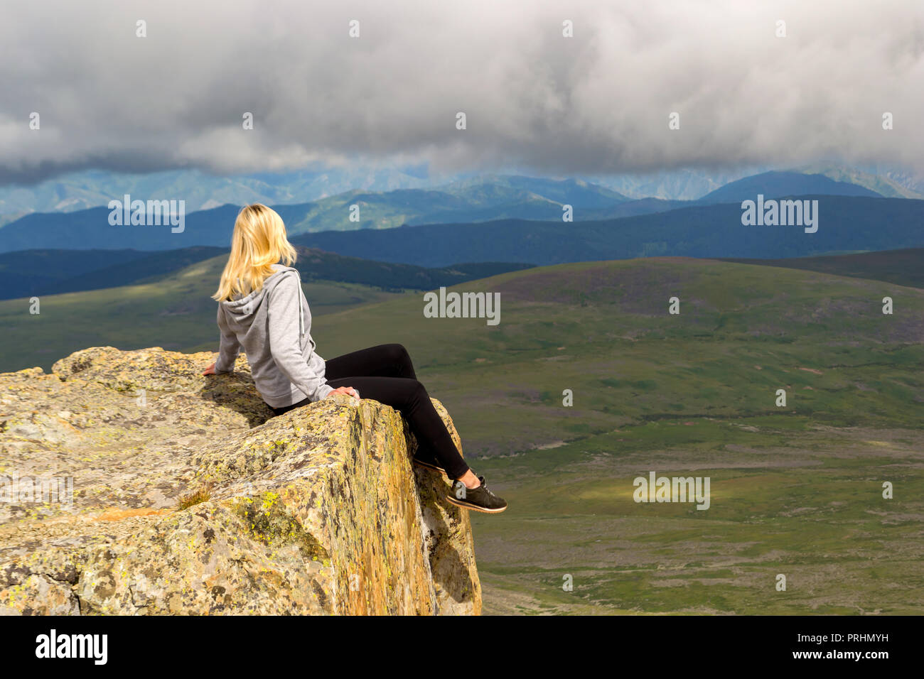 Woman sitting on loo hi-res stock photography and images - Alamy
