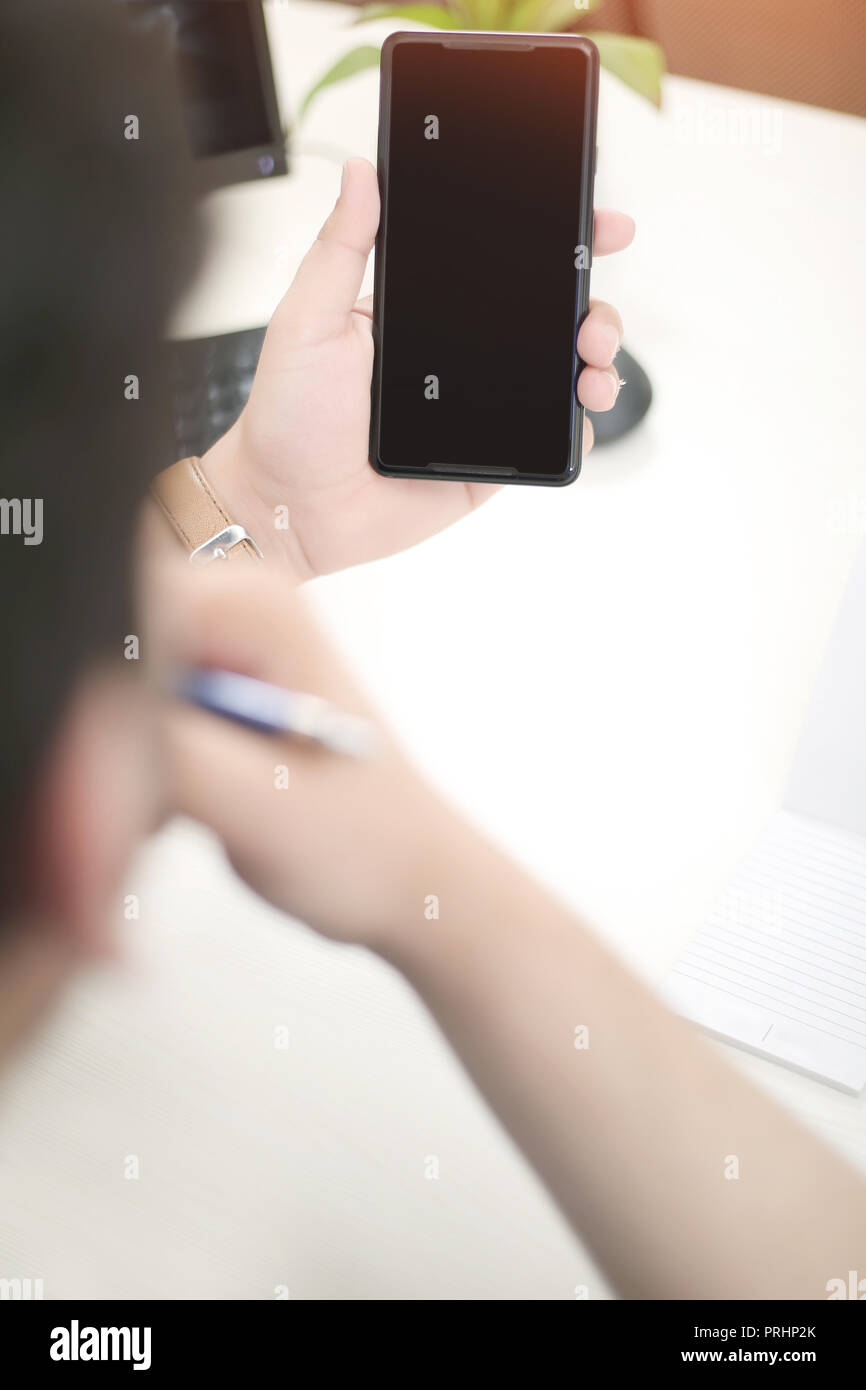 Man is holding phone in hand Stock Photo - Alamy