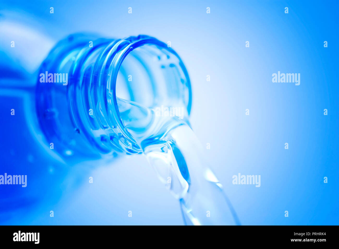 Liquid Pouring From Bottle Stock Photos & Liquid Pouring From Bottle ...