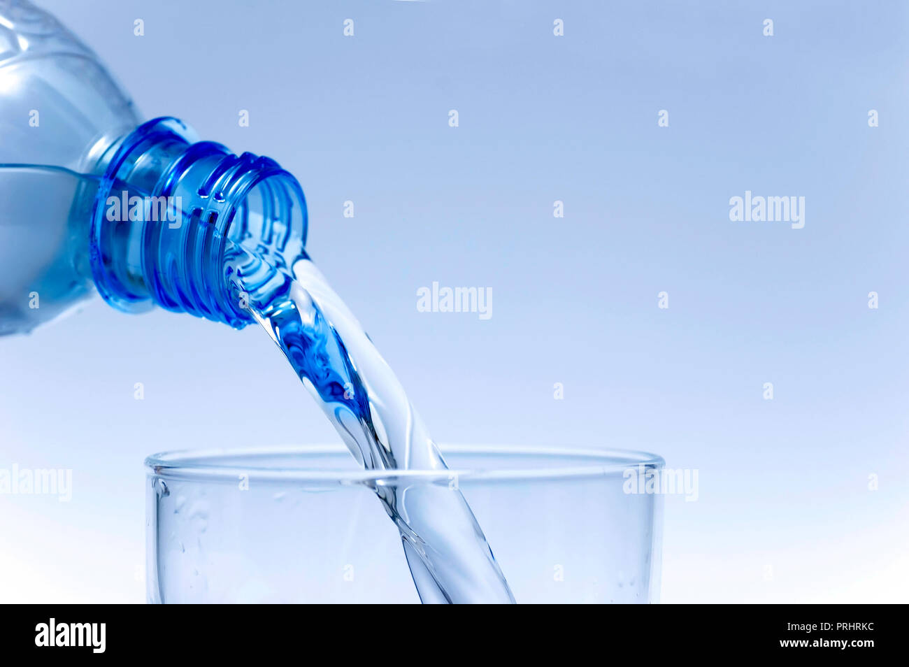 Liquid Pouring From Bottle Stock Photos & Liquid Pouring From Bottle ...